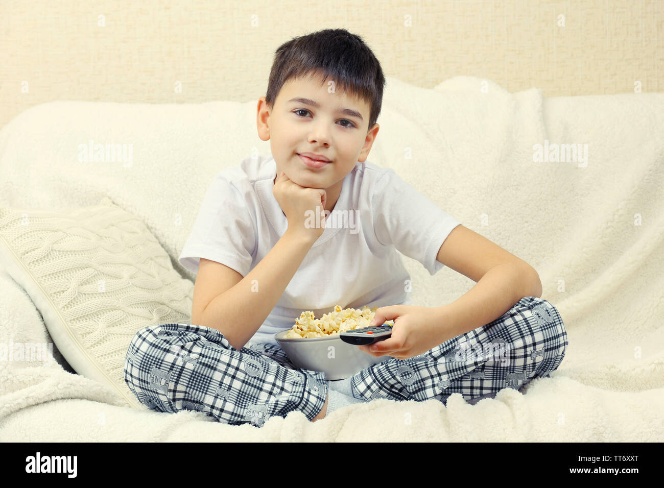 Boy watching TV Stock Photo - Alamy