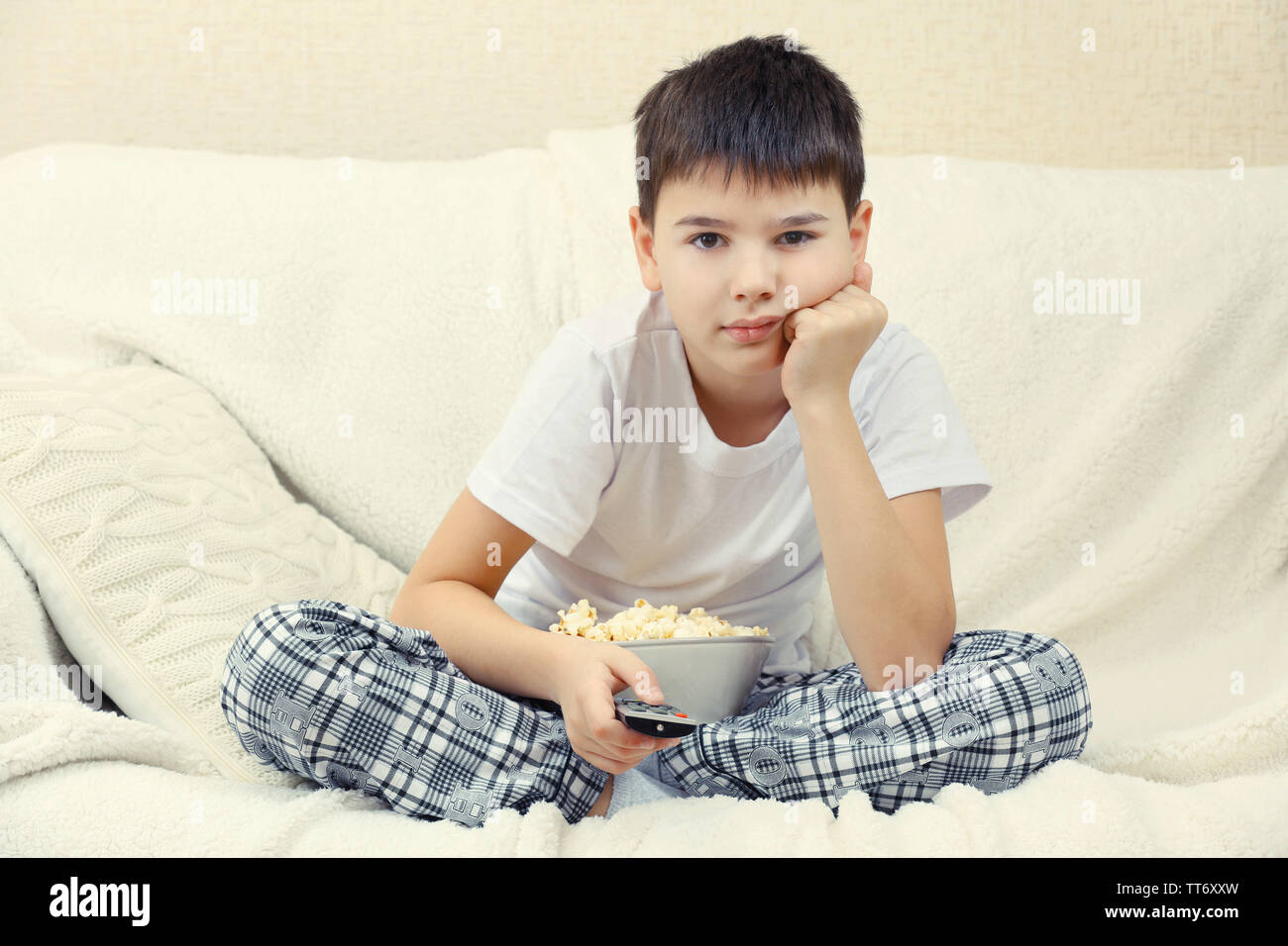 Boy watching TV Stock Photo - Alamy