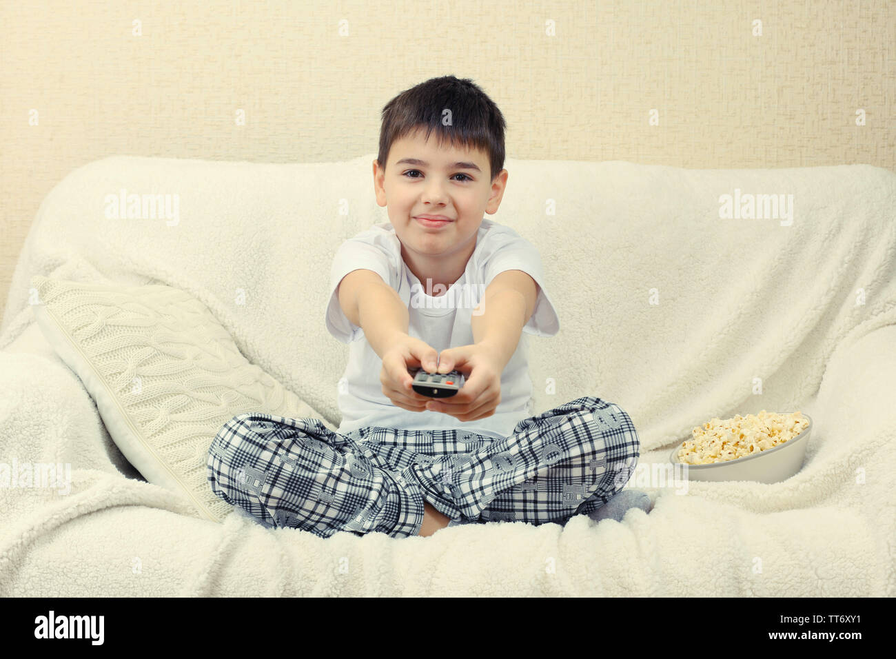 Boy watching TV Stock Photo - Alamy