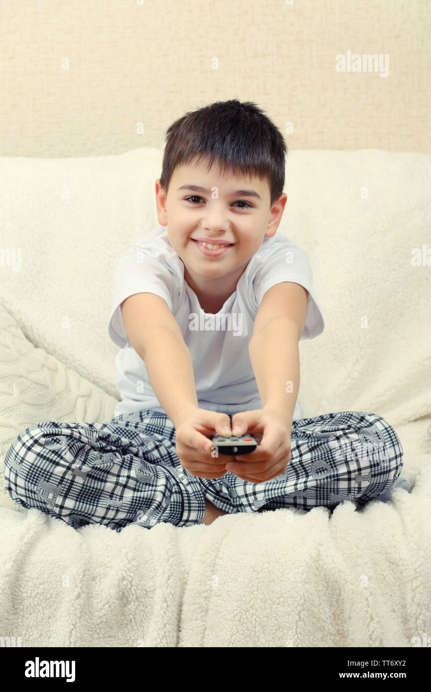 Boy watching TV Stock Photo - Alamy