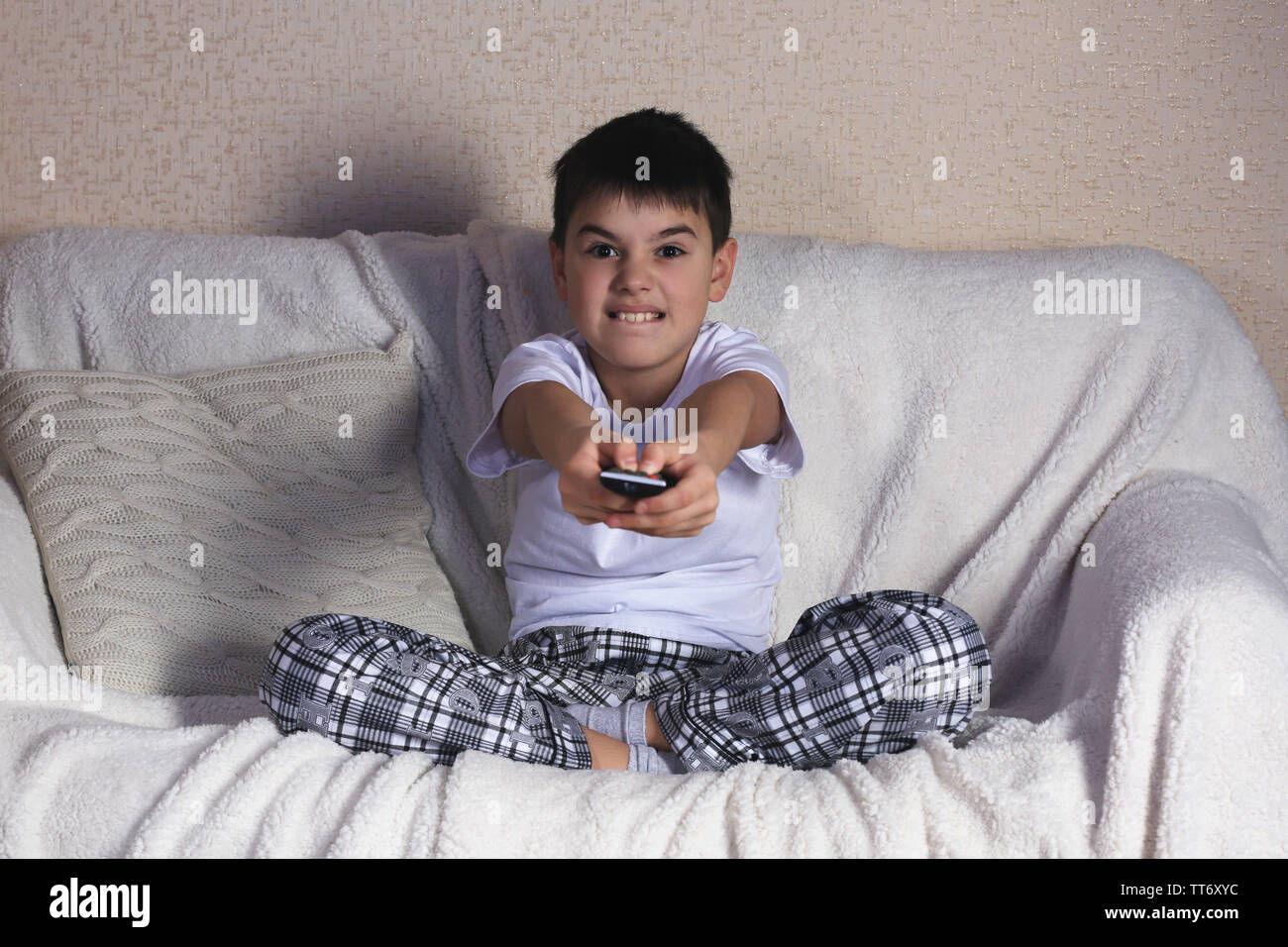Boy watching TV Stock Photo - Alamy