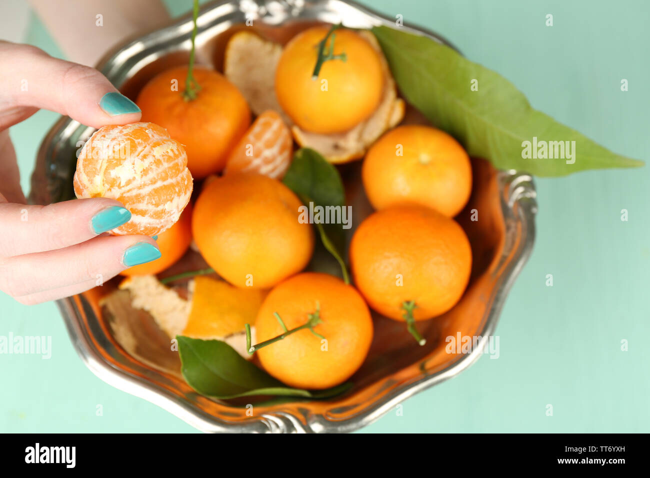 Tangerine peel hand hi-res stock photography and images - Alamy