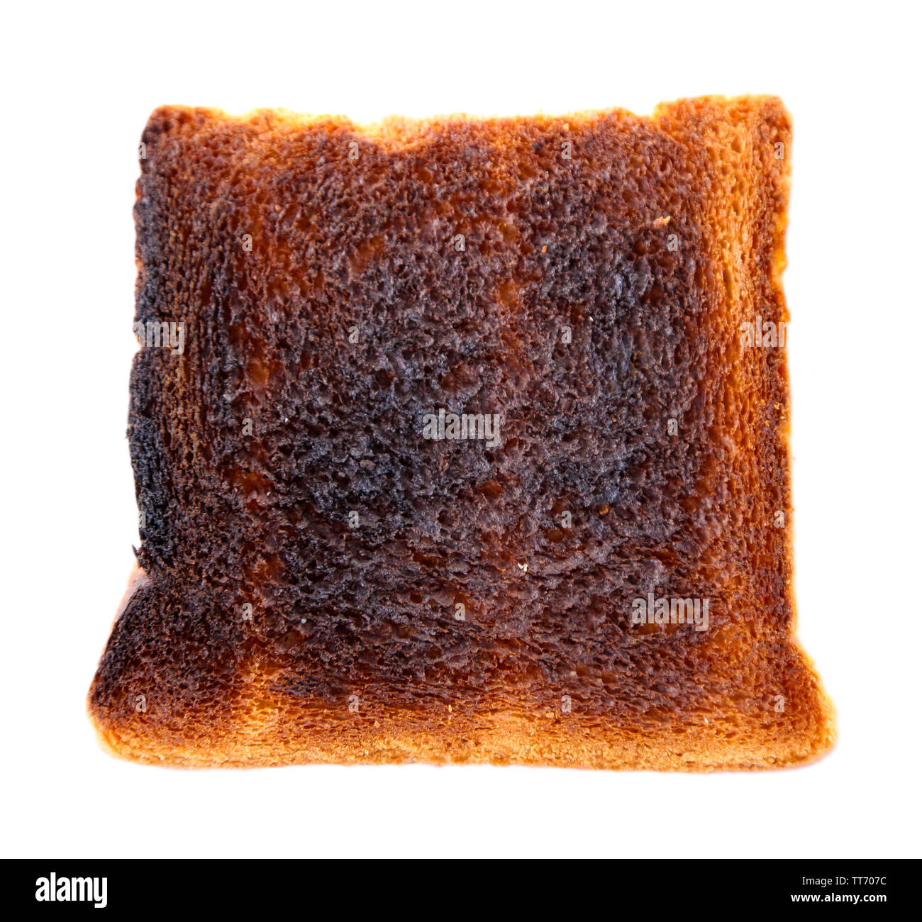 Burnt toast bread isolated on white background Stock Photo - Alamy