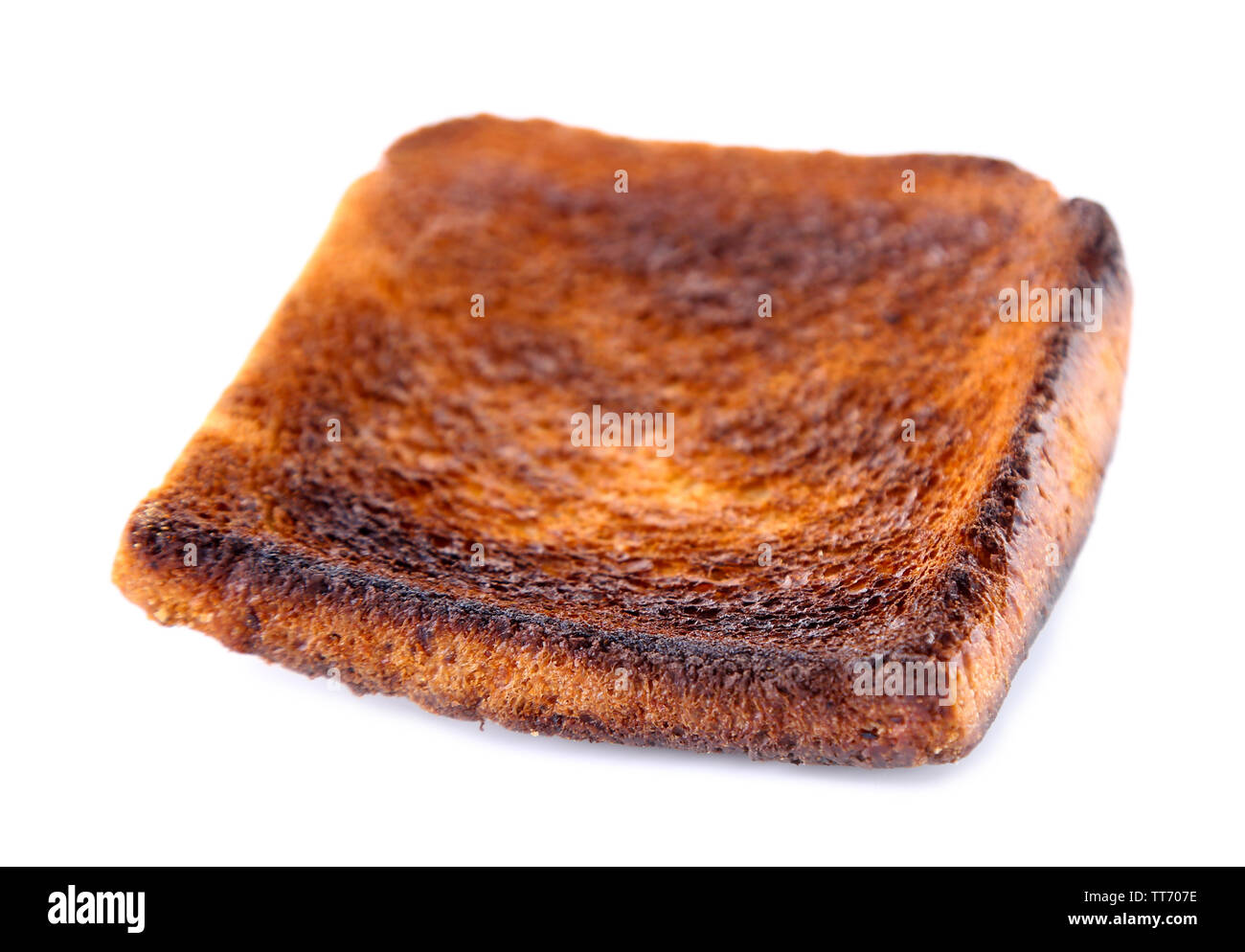 Burnt toast bread isolated on white background Stock Photo - Alamy