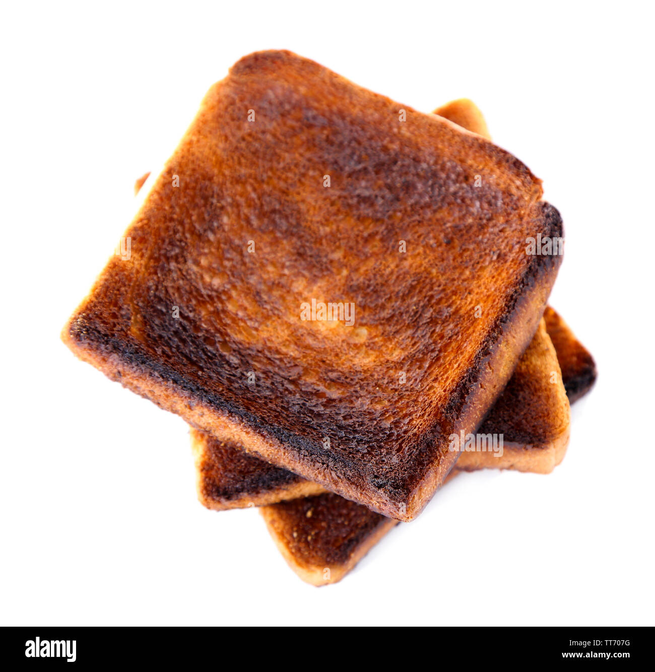 Burnt toast bread isolated on white background Stock Photo - Alamy