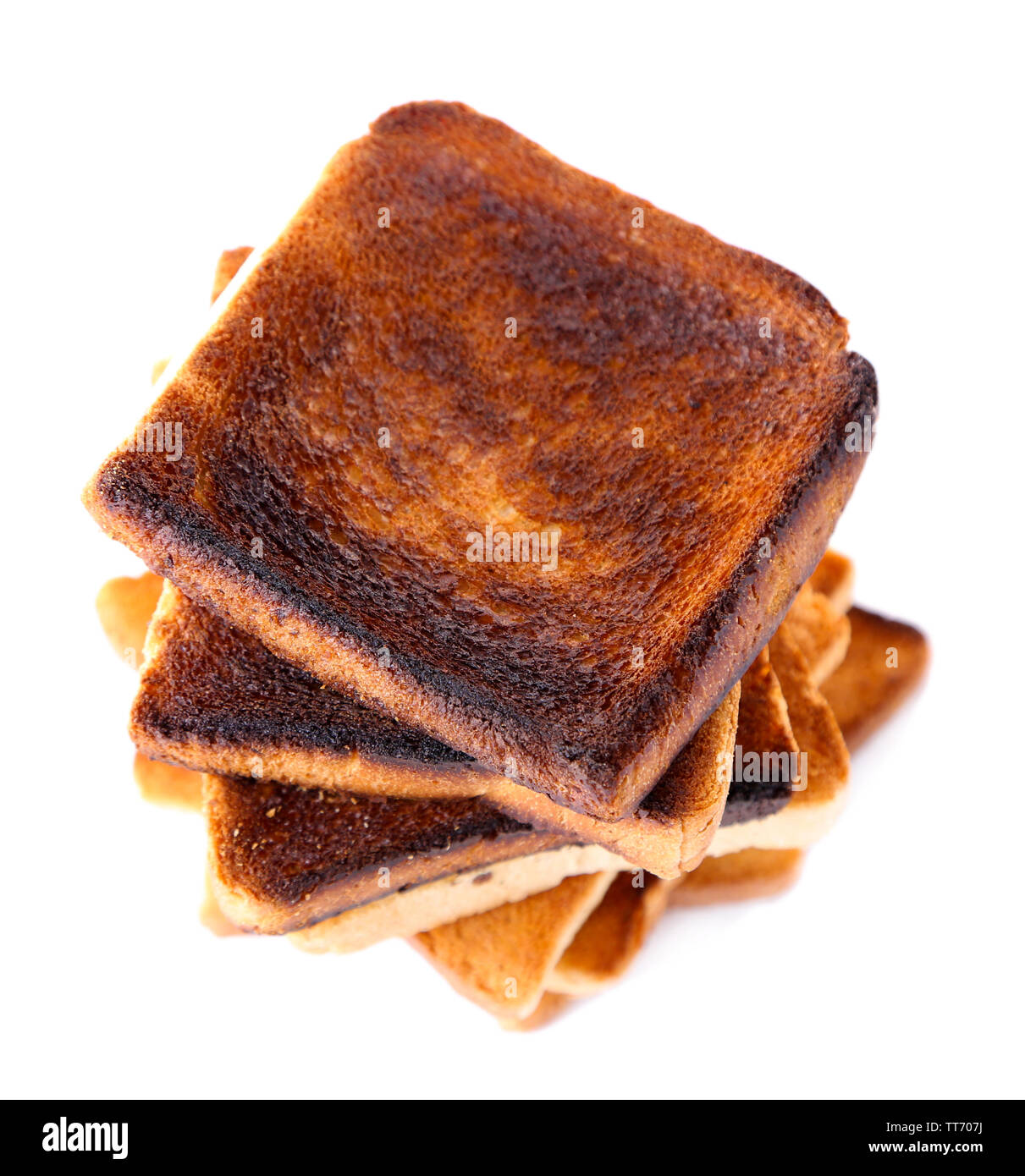 Burnt toast bread isolated on white background Stock Photo - Alamy