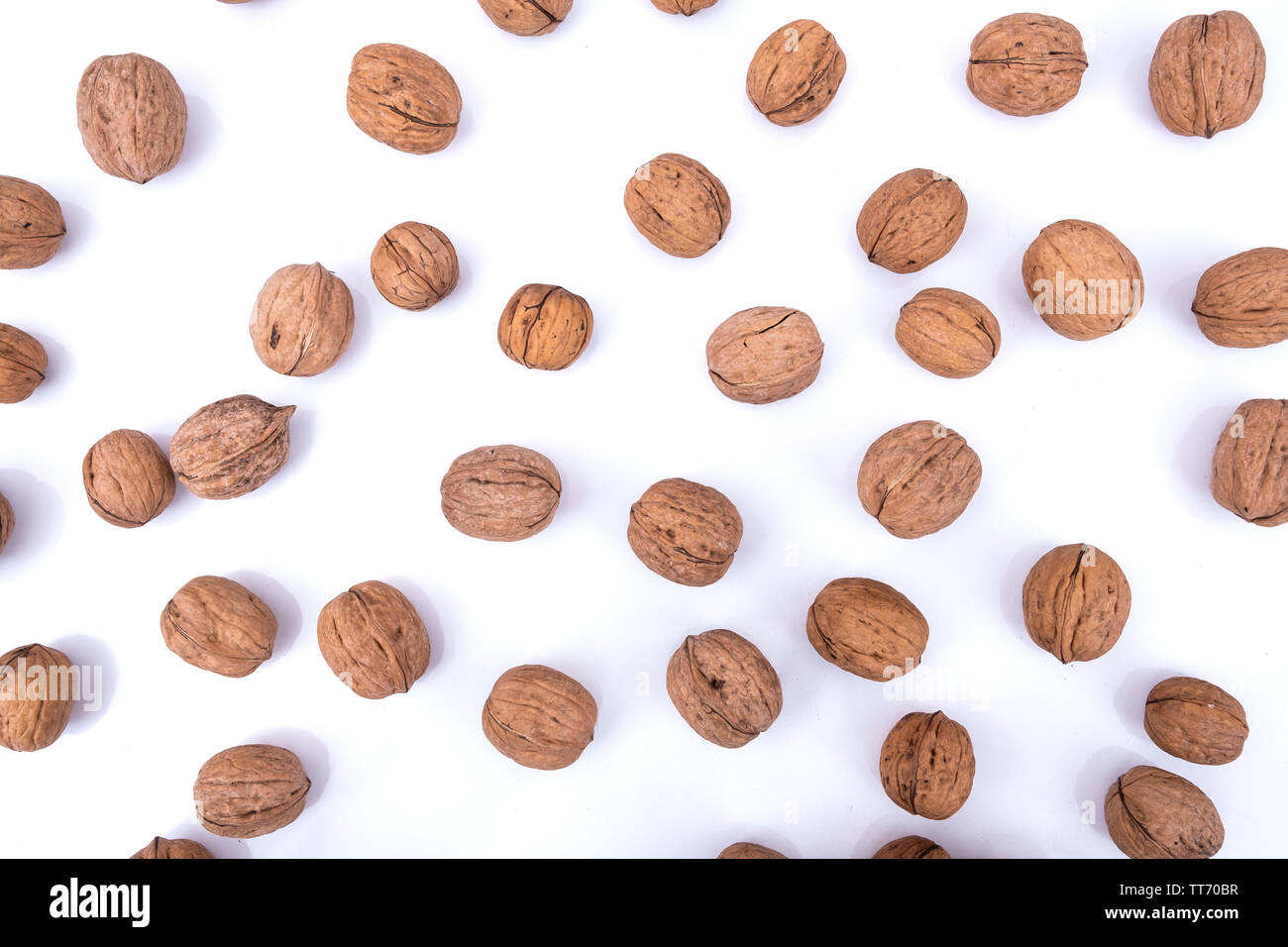 Raw walnuts on isolated white background, top view of walnuts Stock ...