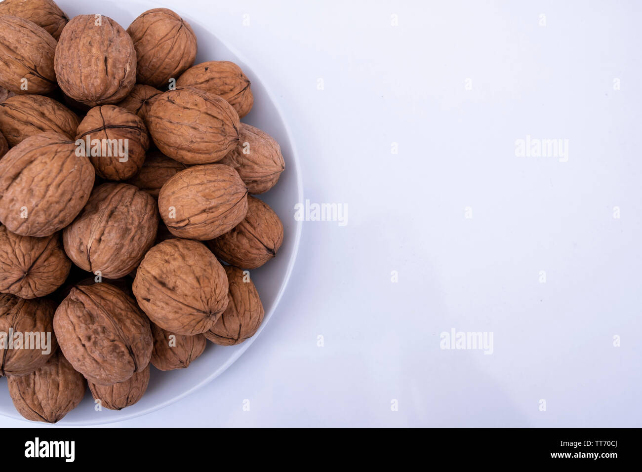 Top view photo of raw walnuts with walnut nutshell Stock Photo - Alamy
