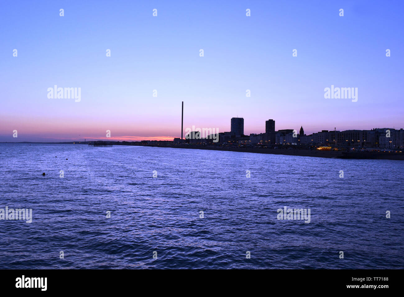 Beautiful panoramic cityscape of Brighton at sunset viewed from the sea ...