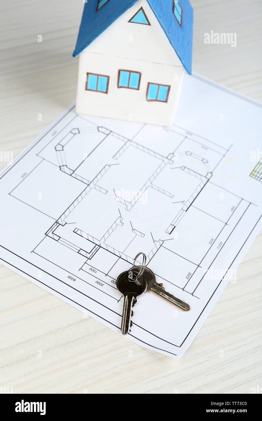 Key on house plan close-up Stock Photo - Alamy