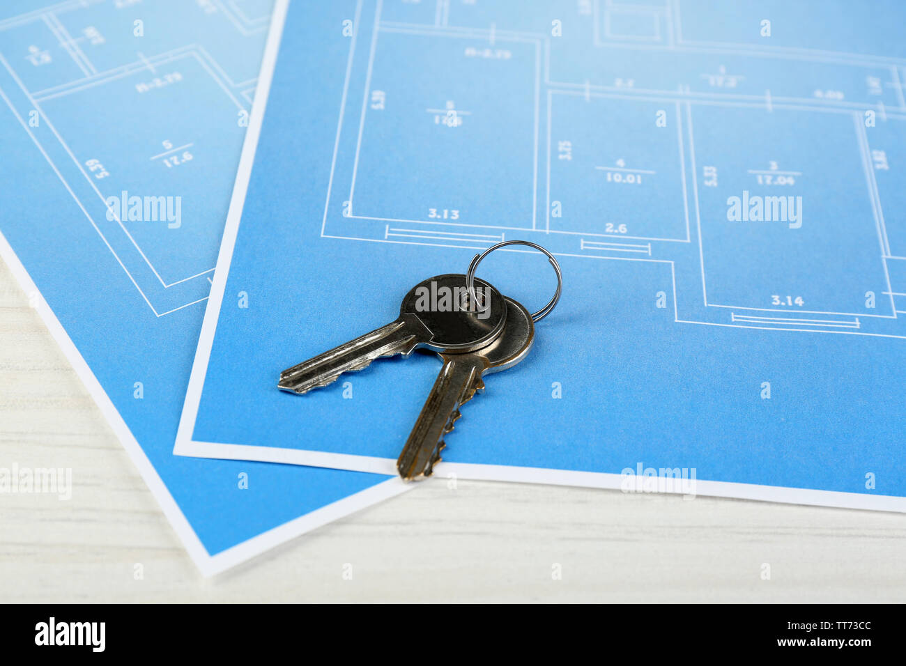 Key on house plan close-up Stock Photo - Alamy