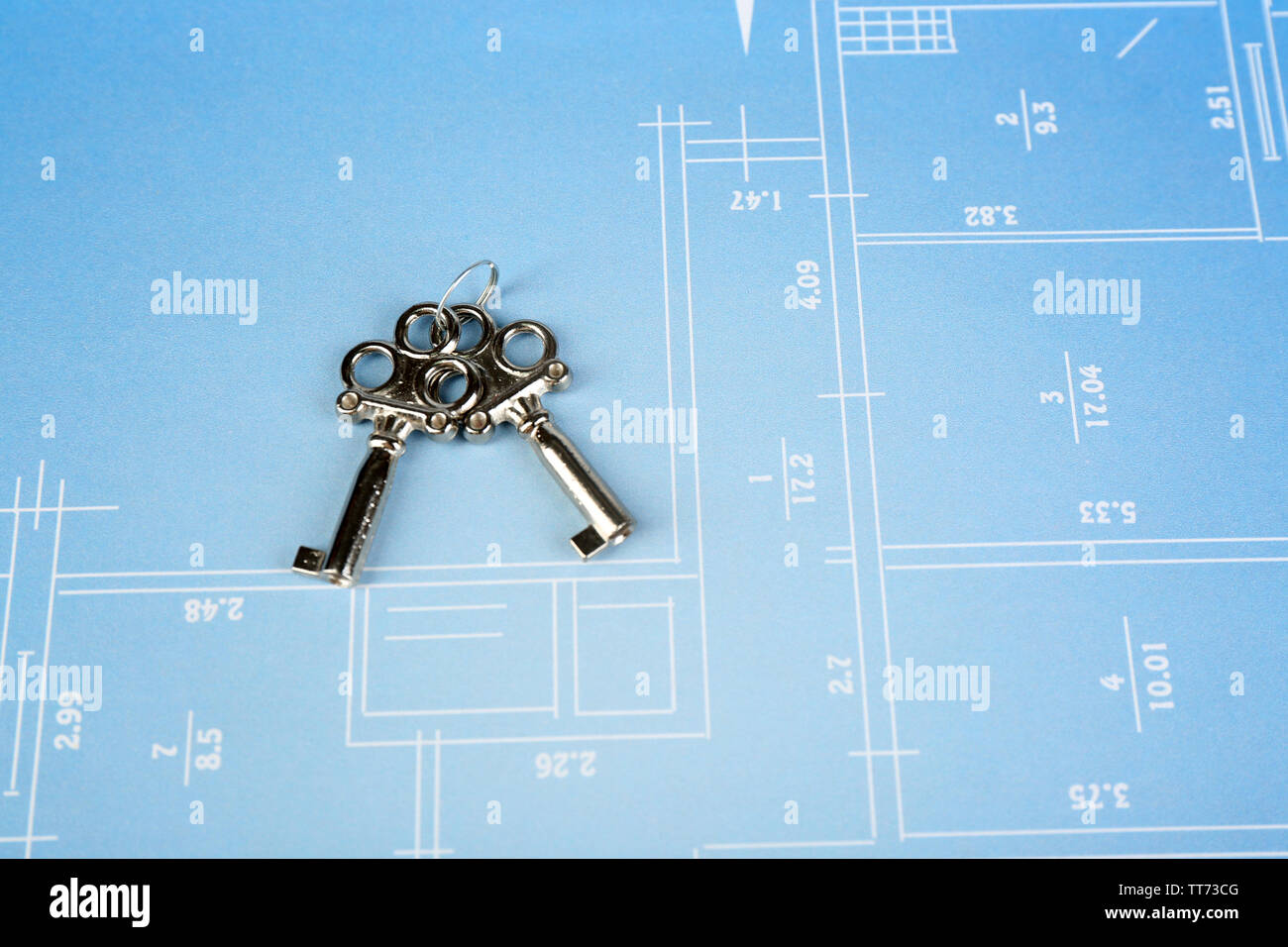 Key on house plan close-up Stock Photo - Alamy