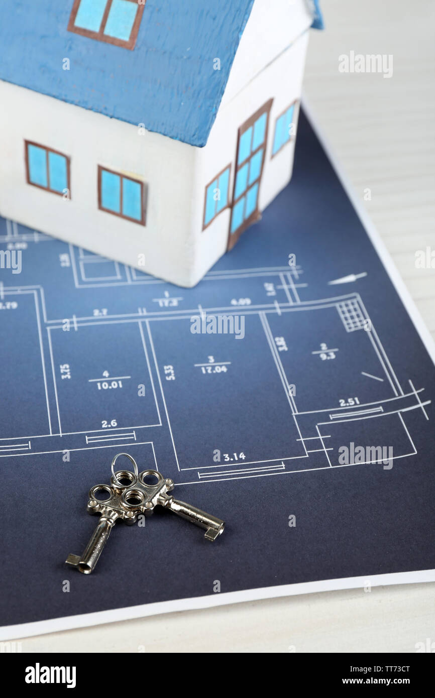 Key on house plan close-up Stock Photo - Alamy