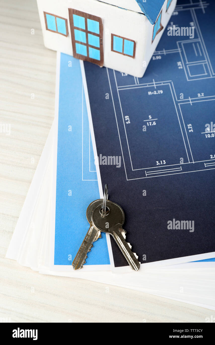 Key on house plan close-up Stock Photo - Alamy