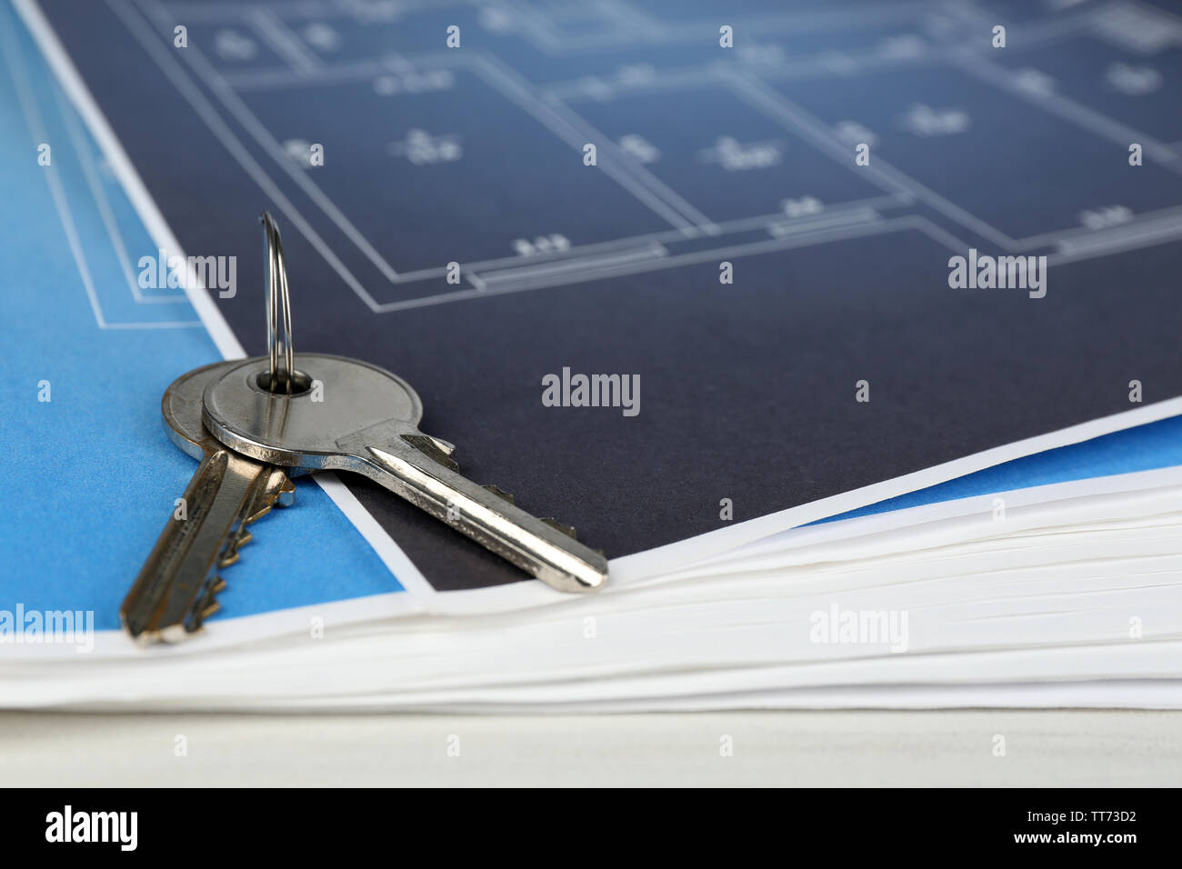 Key on house plan close-up Stock Photo - Alamy