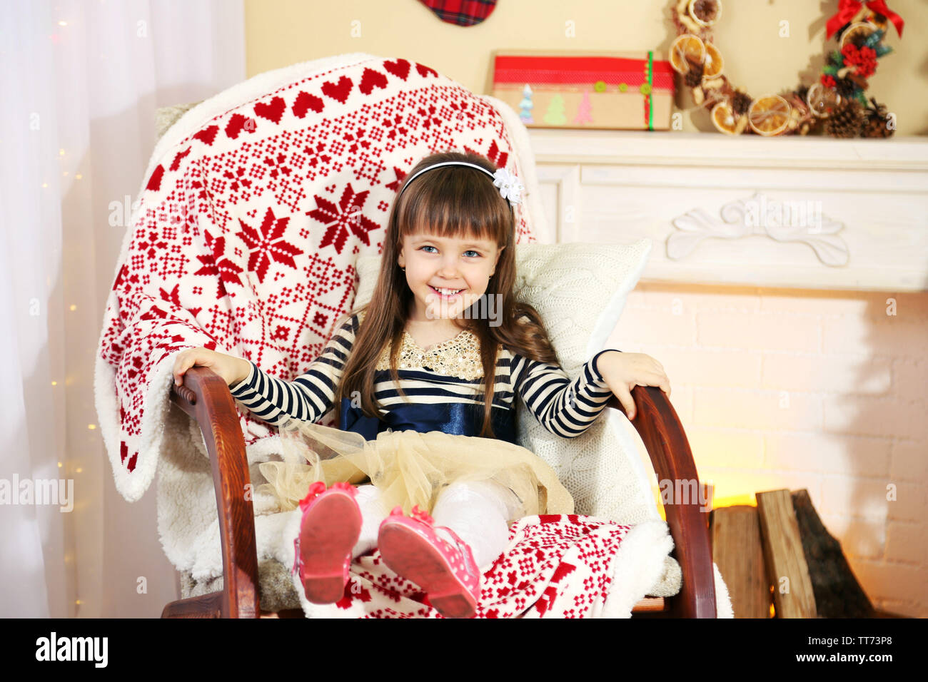 Girl sitting in rocking chair hi-res stock photography and images - Alamy