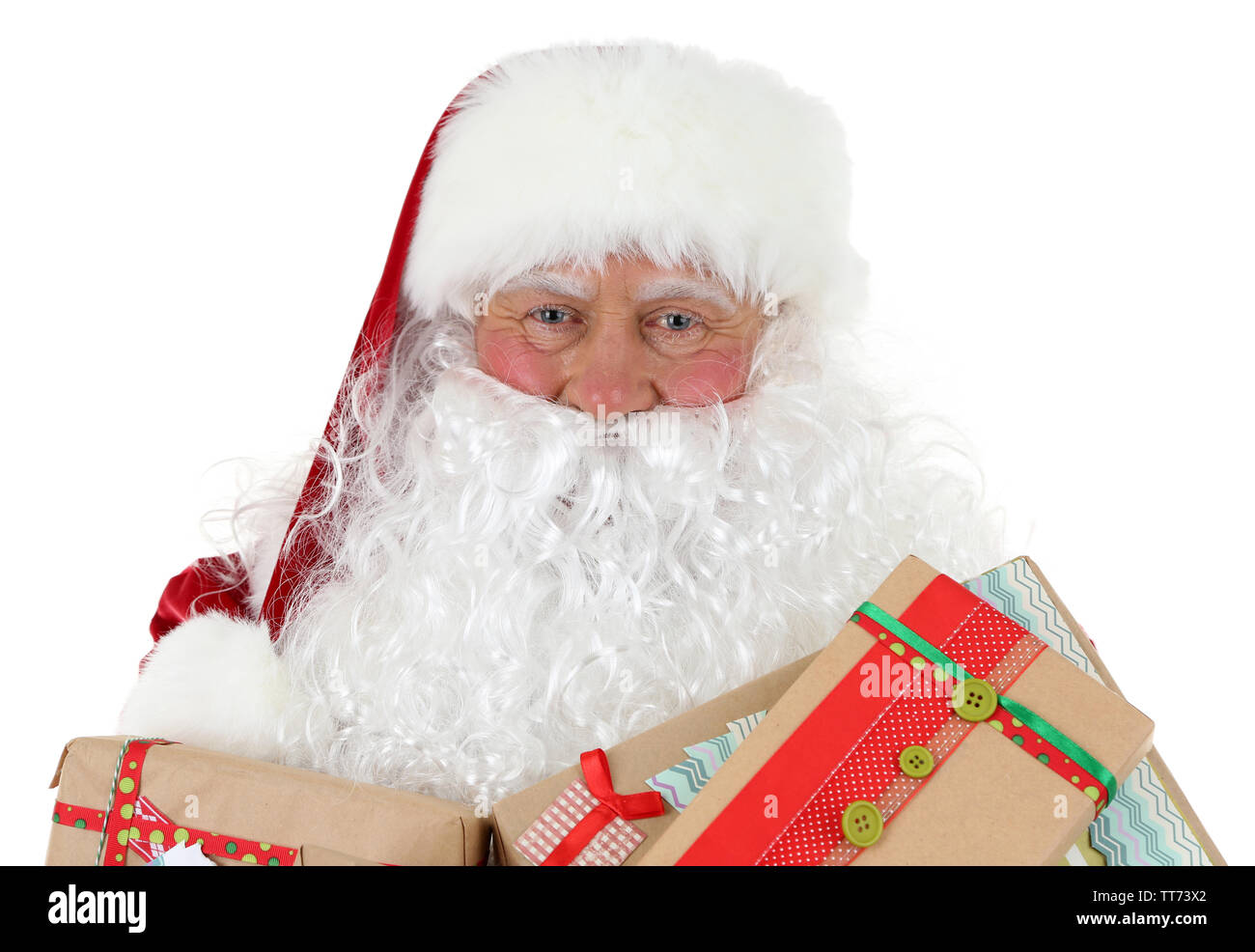 Santa Claus holding gift boxes isolated on white background Stock Photo ...