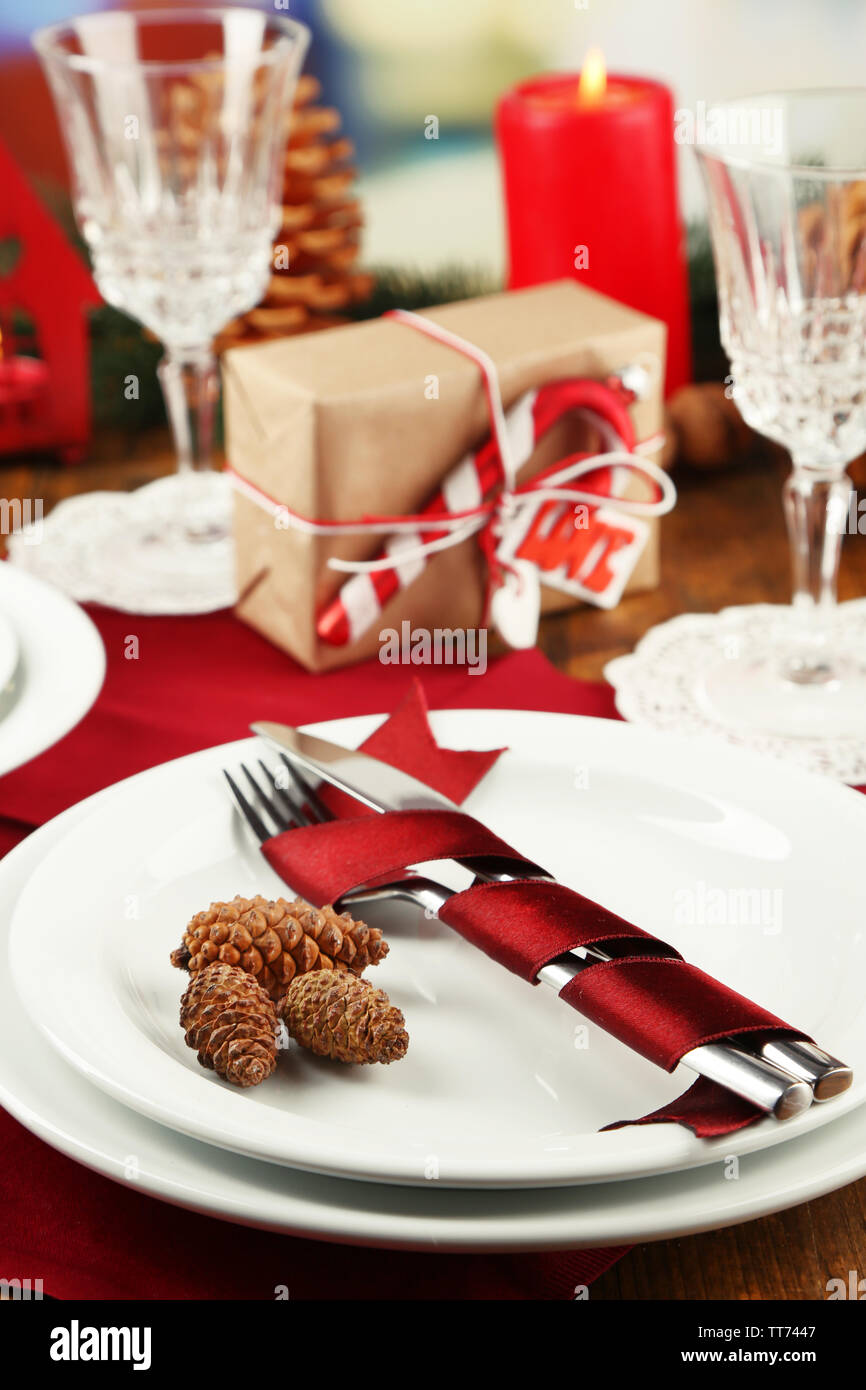 Holiday table setting with Christmas decoration background Stock Photo ...