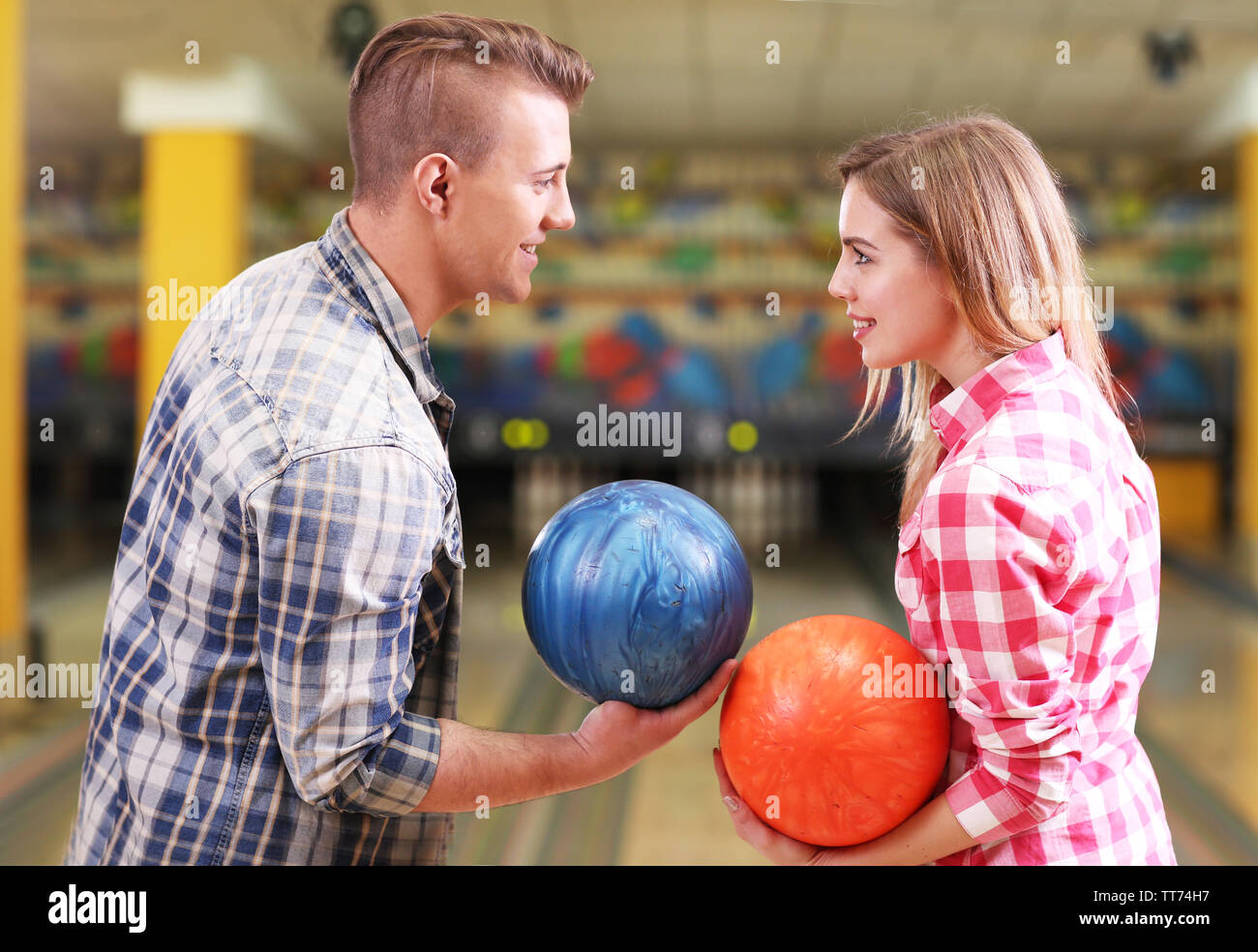Portrait of friends in bowling club Stock Photo - Alamy