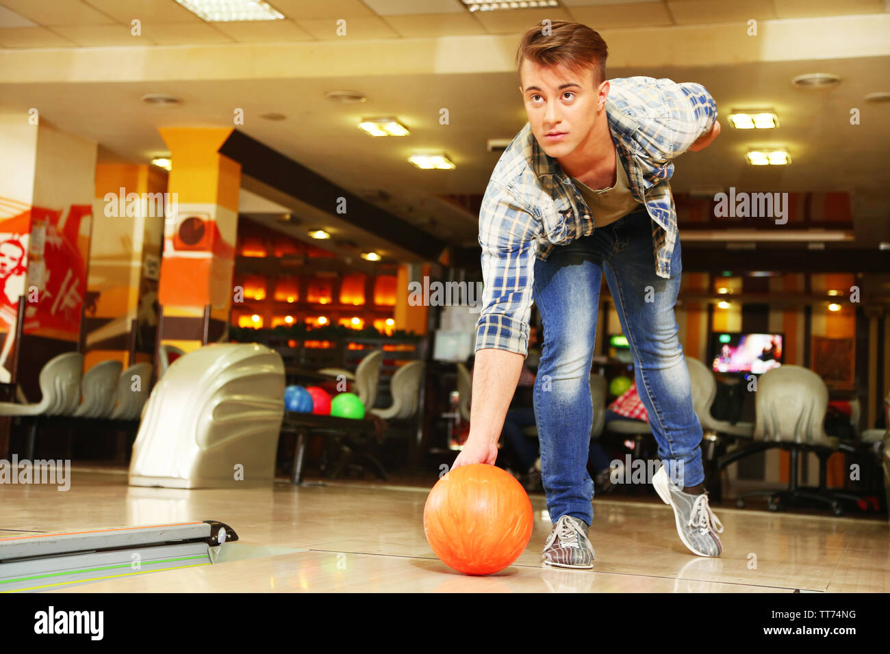 Man holding bowling ball in hi-res stock photography and images - Alamy