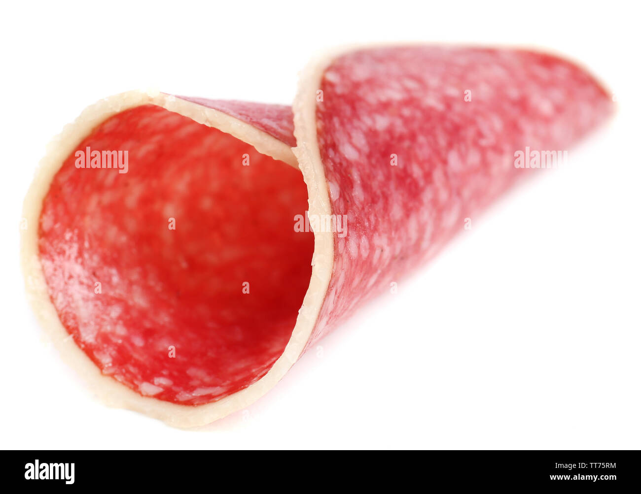 Slice of salami isolated on white background Stock Photo - Alamy