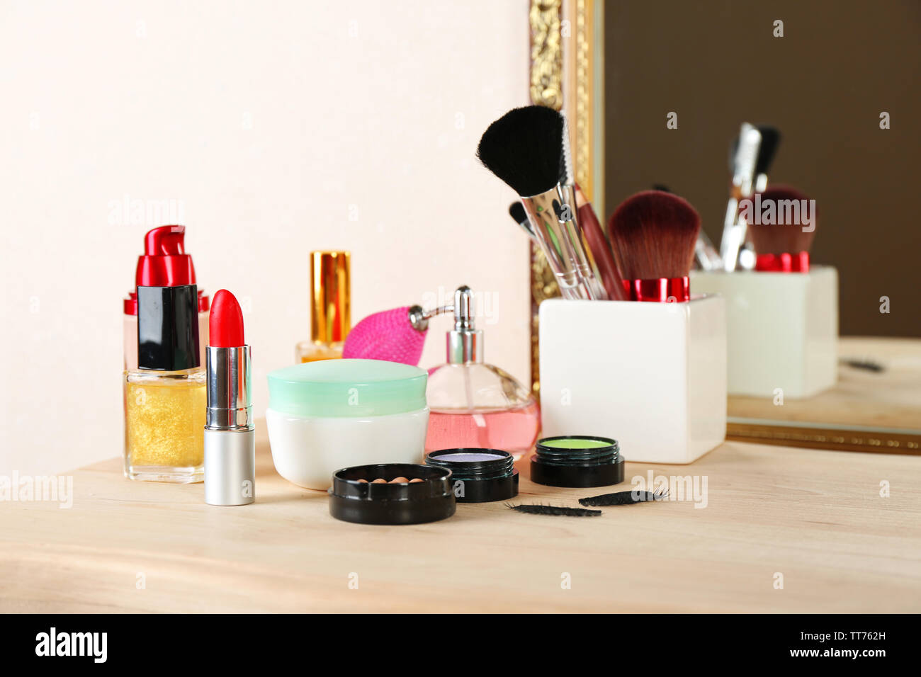 Different cosmetics on dressing table, close up Stock Photo - Alamy