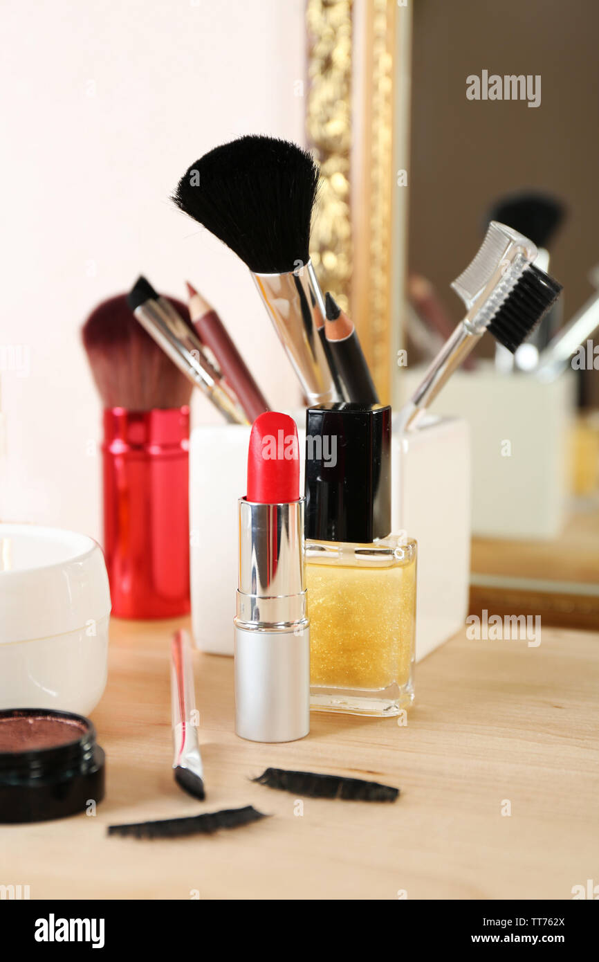 Different cosmetics on dressing table, close up Stock Photo - Alamy