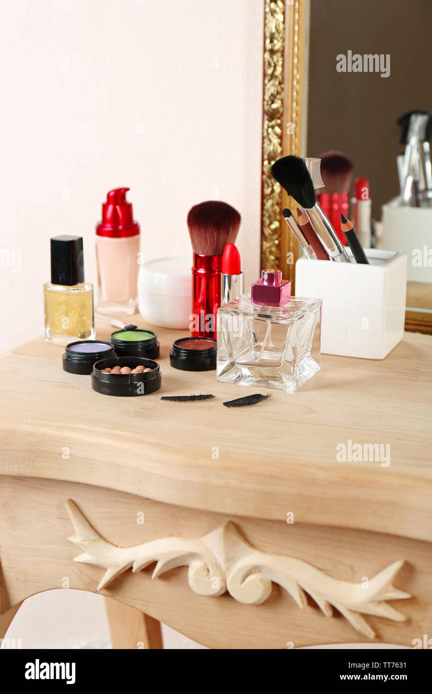 Different cosmetics on dressing table, close up Stock Photo - Alamy