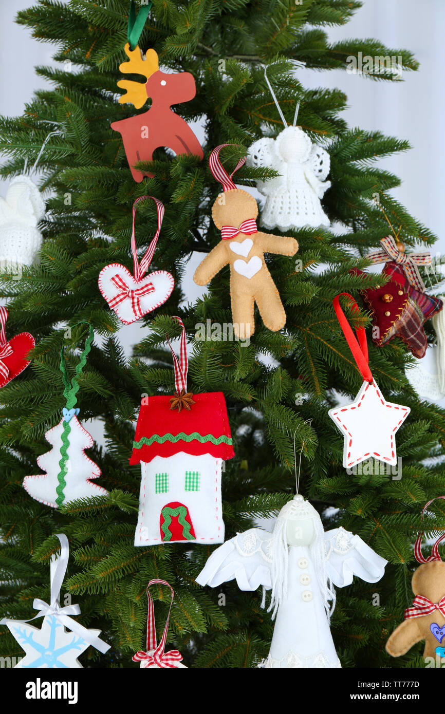Christmas handmade decorations on Christmas tree background Stock Photo ...