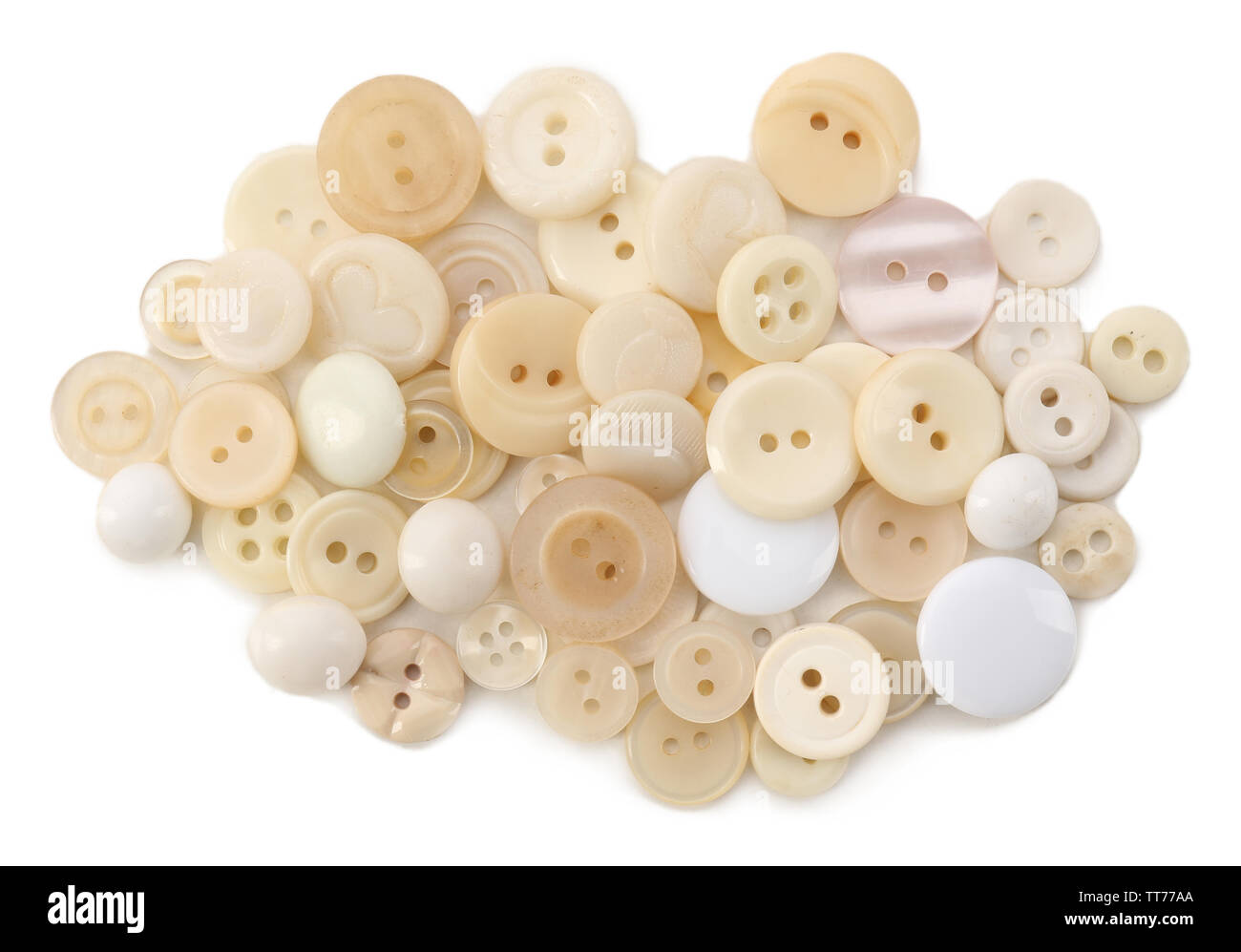 Beige sewing buttons isolated on white Stock Photo - Alamy