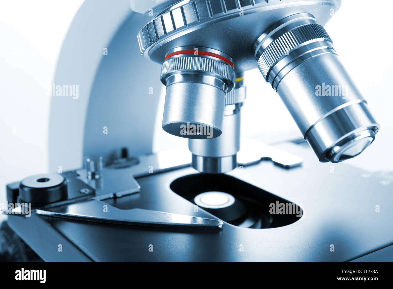Microscope close-up, isolated on white Stock Photo - Alamy