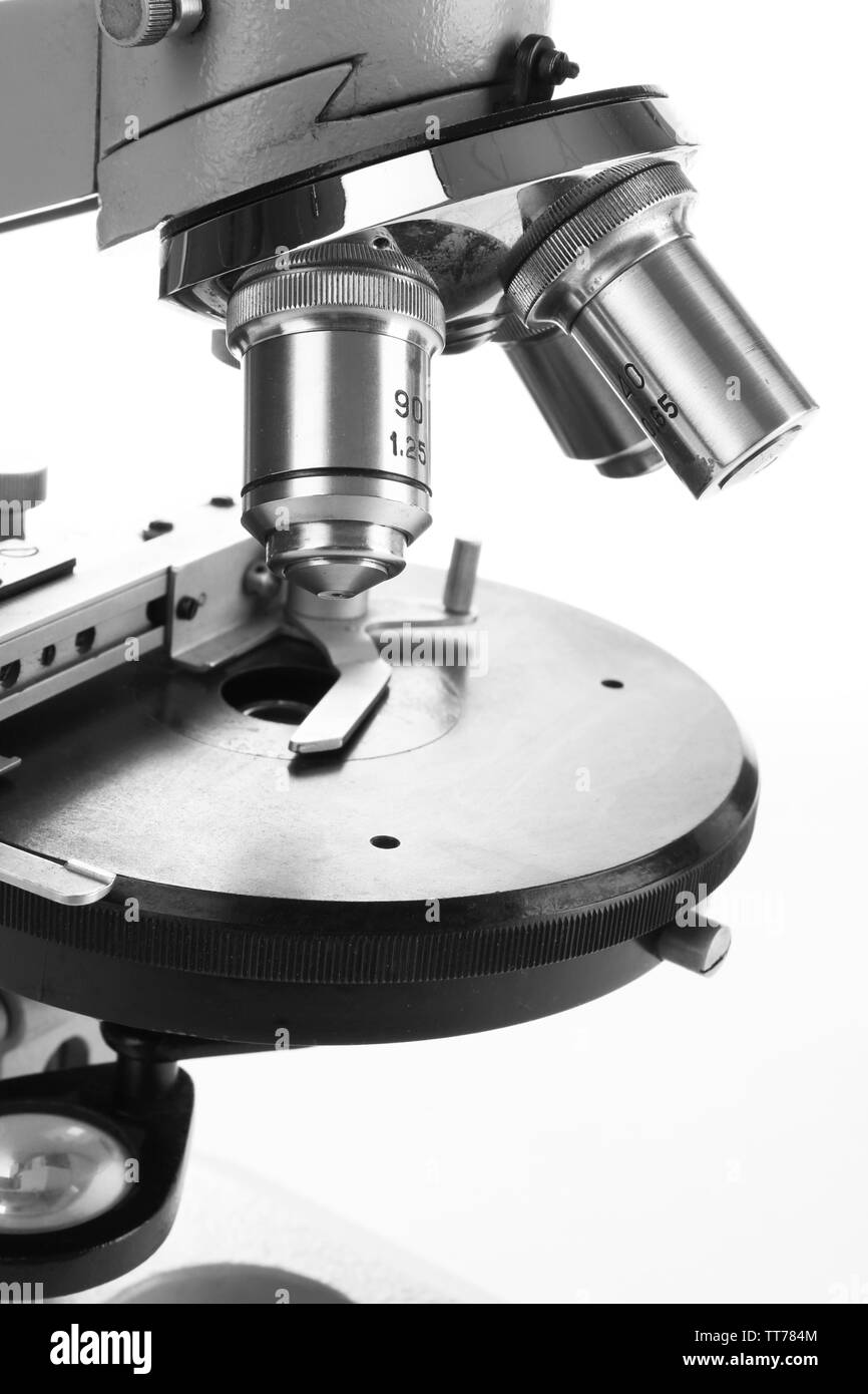 Microscope close-up, isolated on white Stock Photo - Alamy