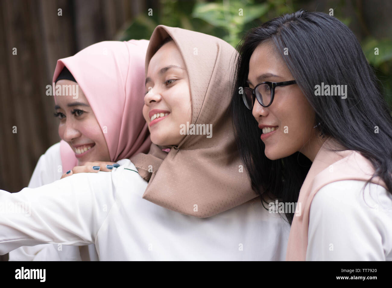 happy best friend woman muslim taking selfie together Stock Photo - Alamy
