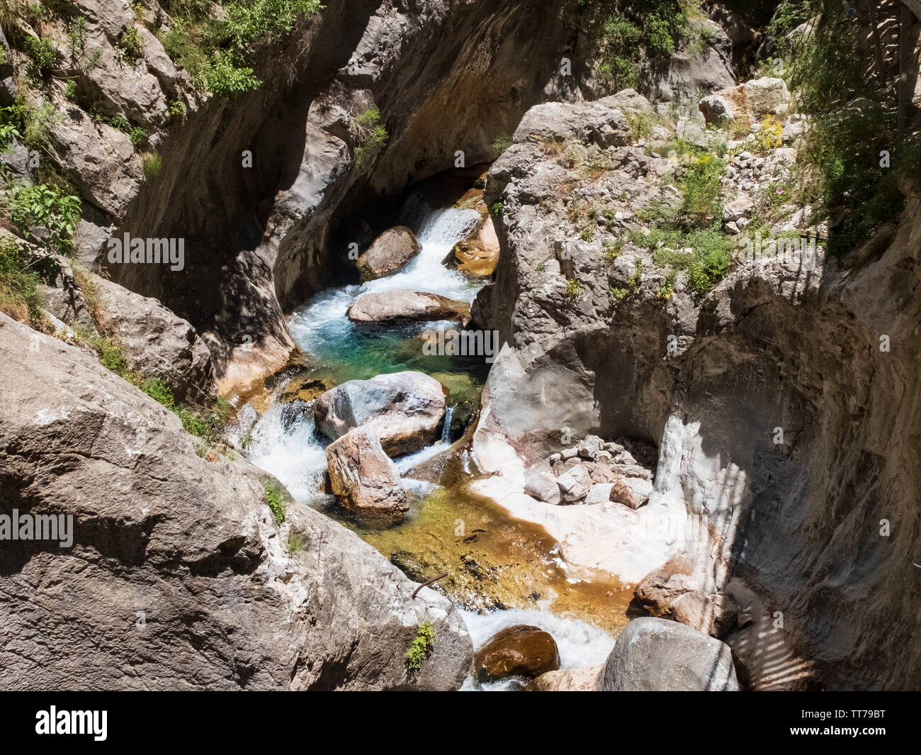 Mountain creek flowing between boulders at Sapadere Canyon, Alanya ...
