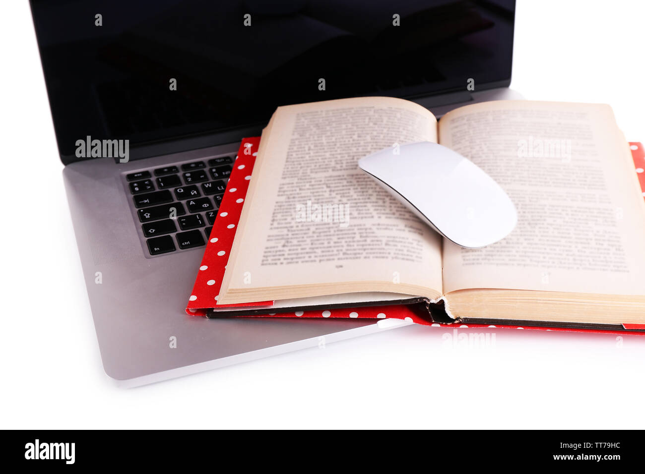 Laptop, open book and computer mouse on white background Stock Photo ...