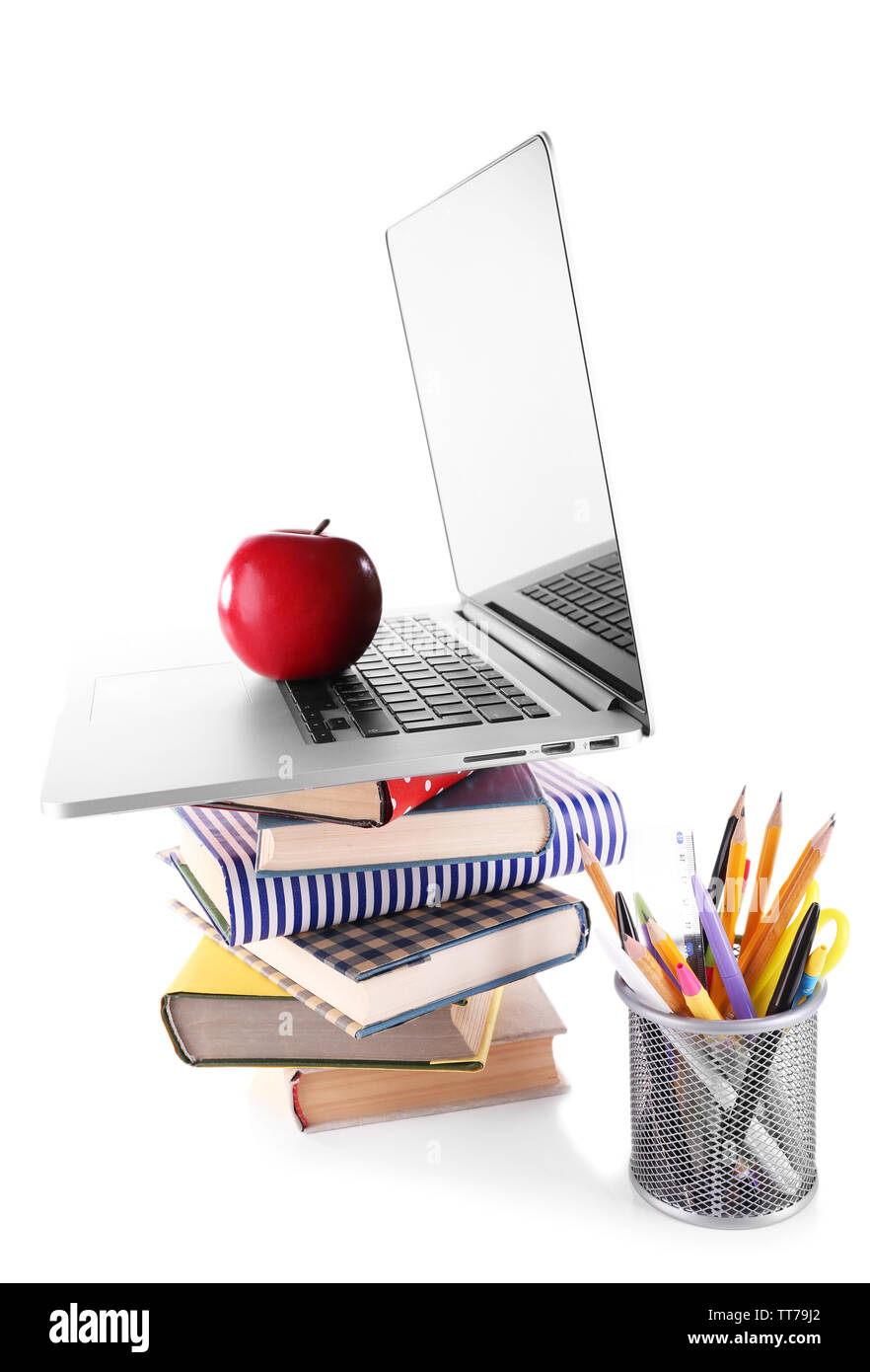 Pile of books with laptop isolated on white Stock Photo - Alamy