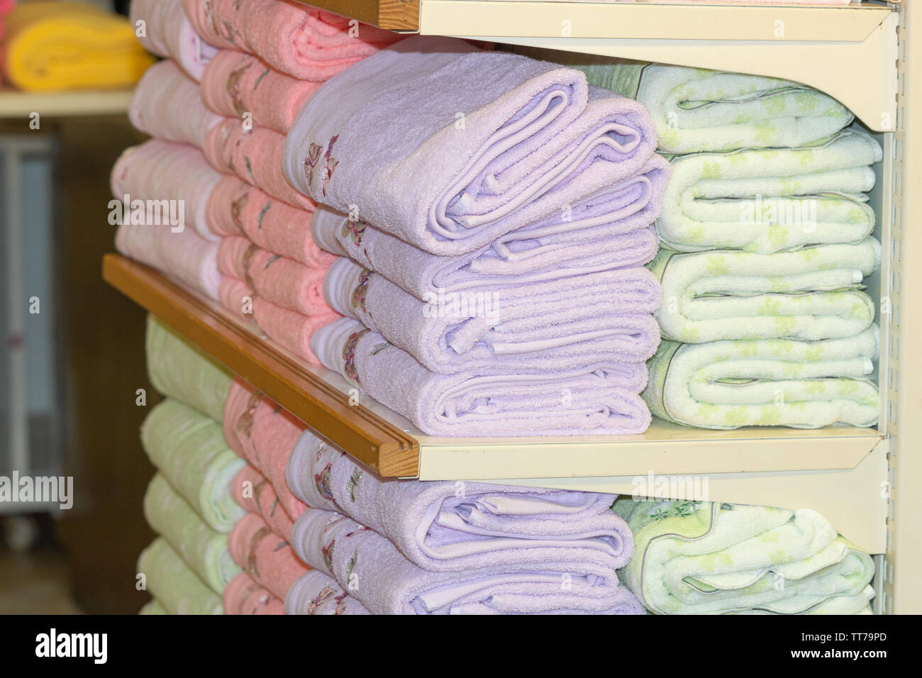 Stack of multicolored bath towels Stock Photo - Alamy