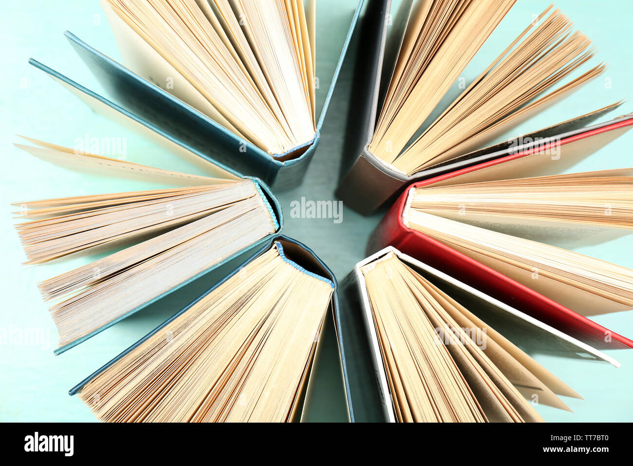 Group of books on colorful background, top view Stock Photo - Alamy