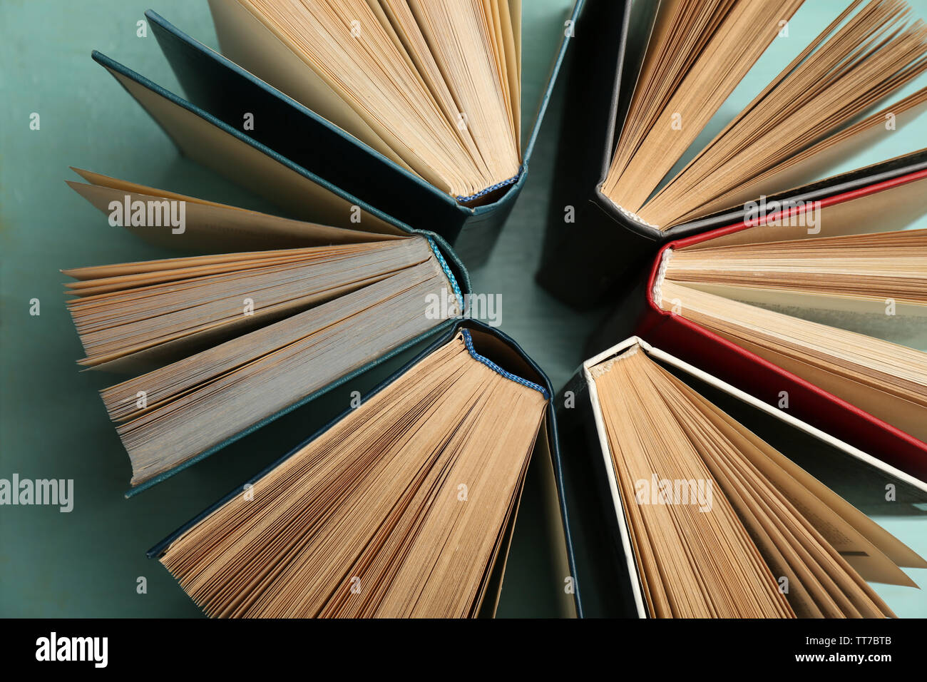 Group of books on colorful background, top view Stock Photo - Alamy