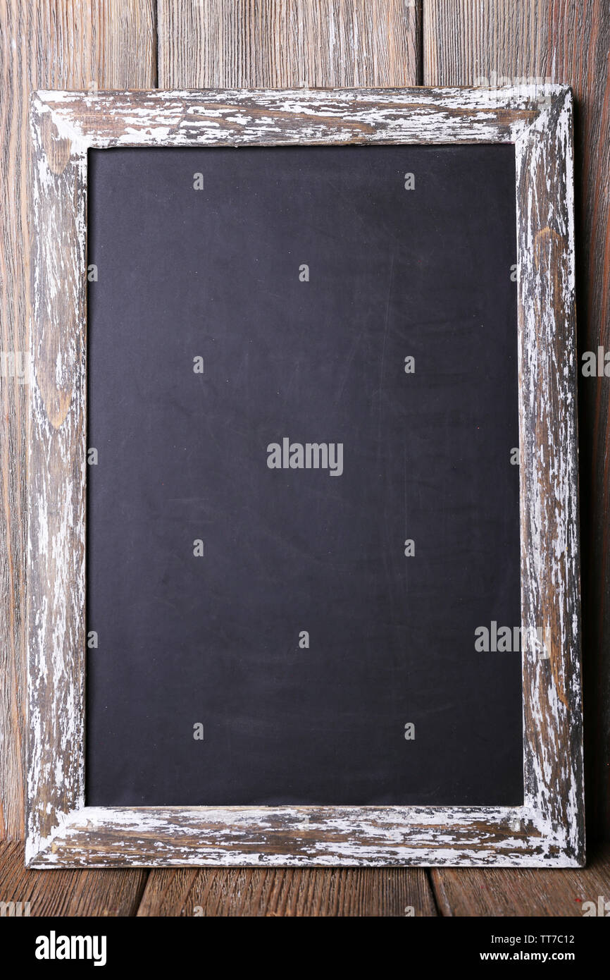 Menu board on rustic wooden planks background Stock Photo - Alamy