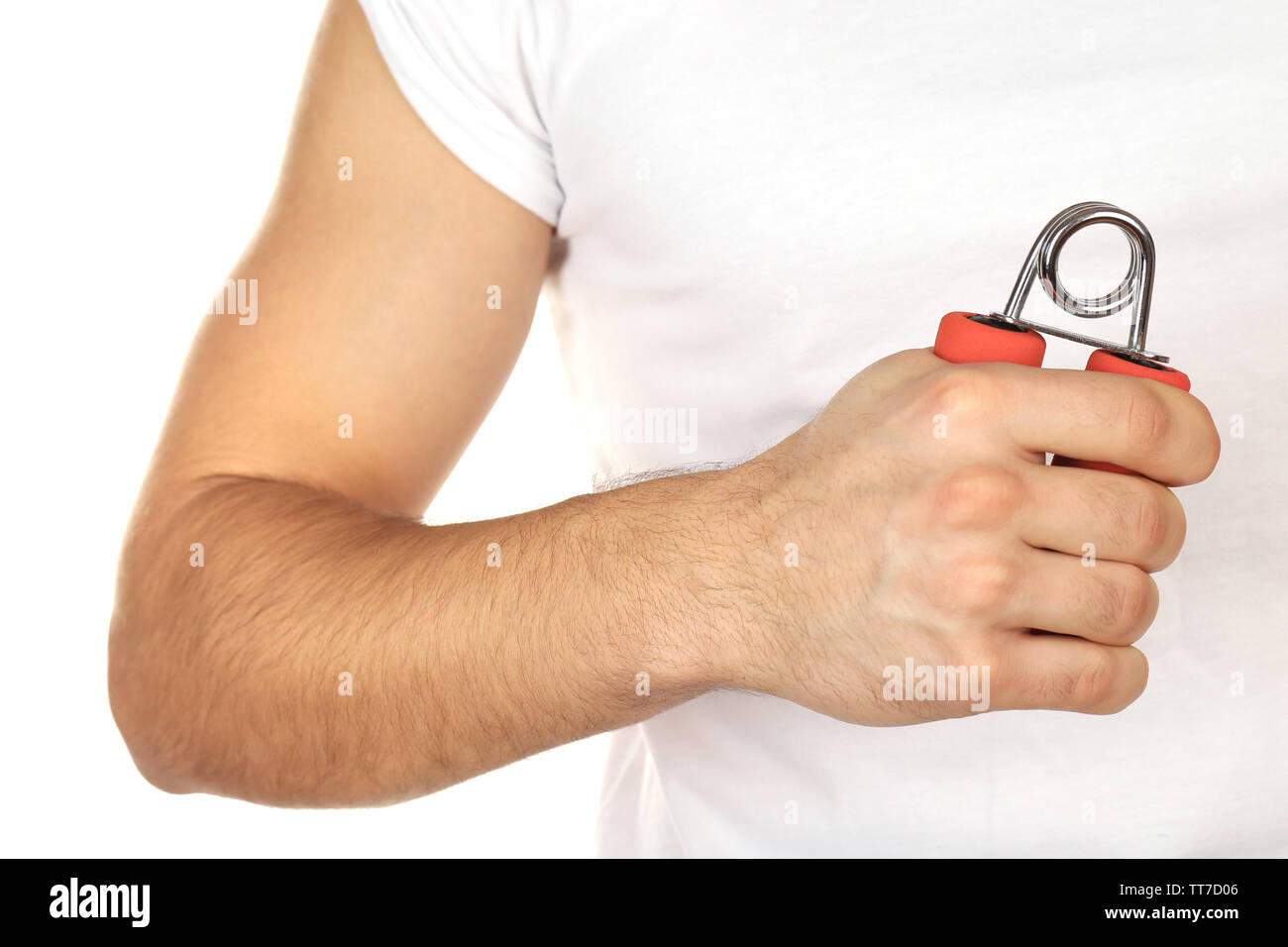 Hand trainer with steel spring in male hand, isolated on white Stock ...