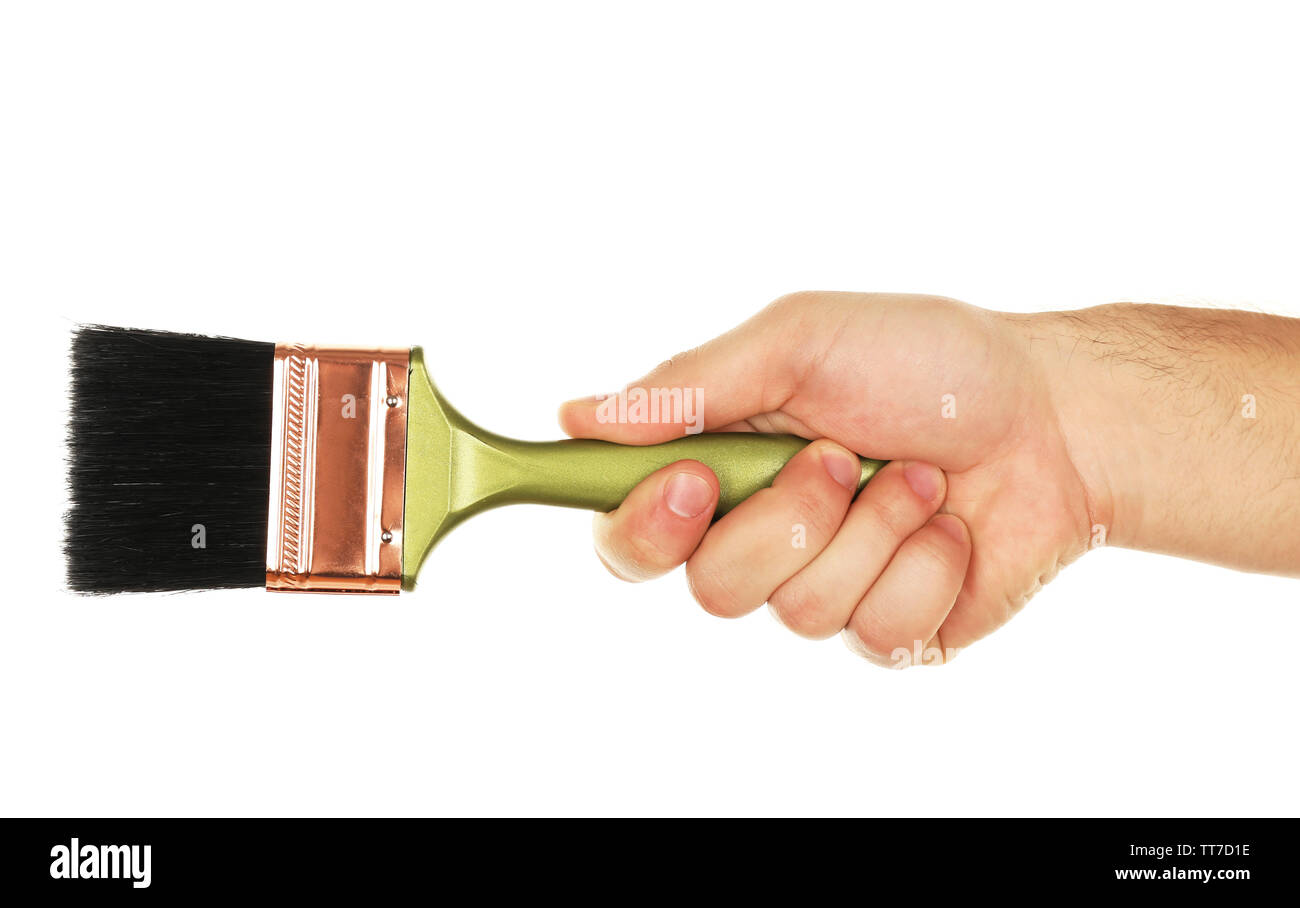 Paintbrush in male hand isolated on white Stock Photo - Alamy