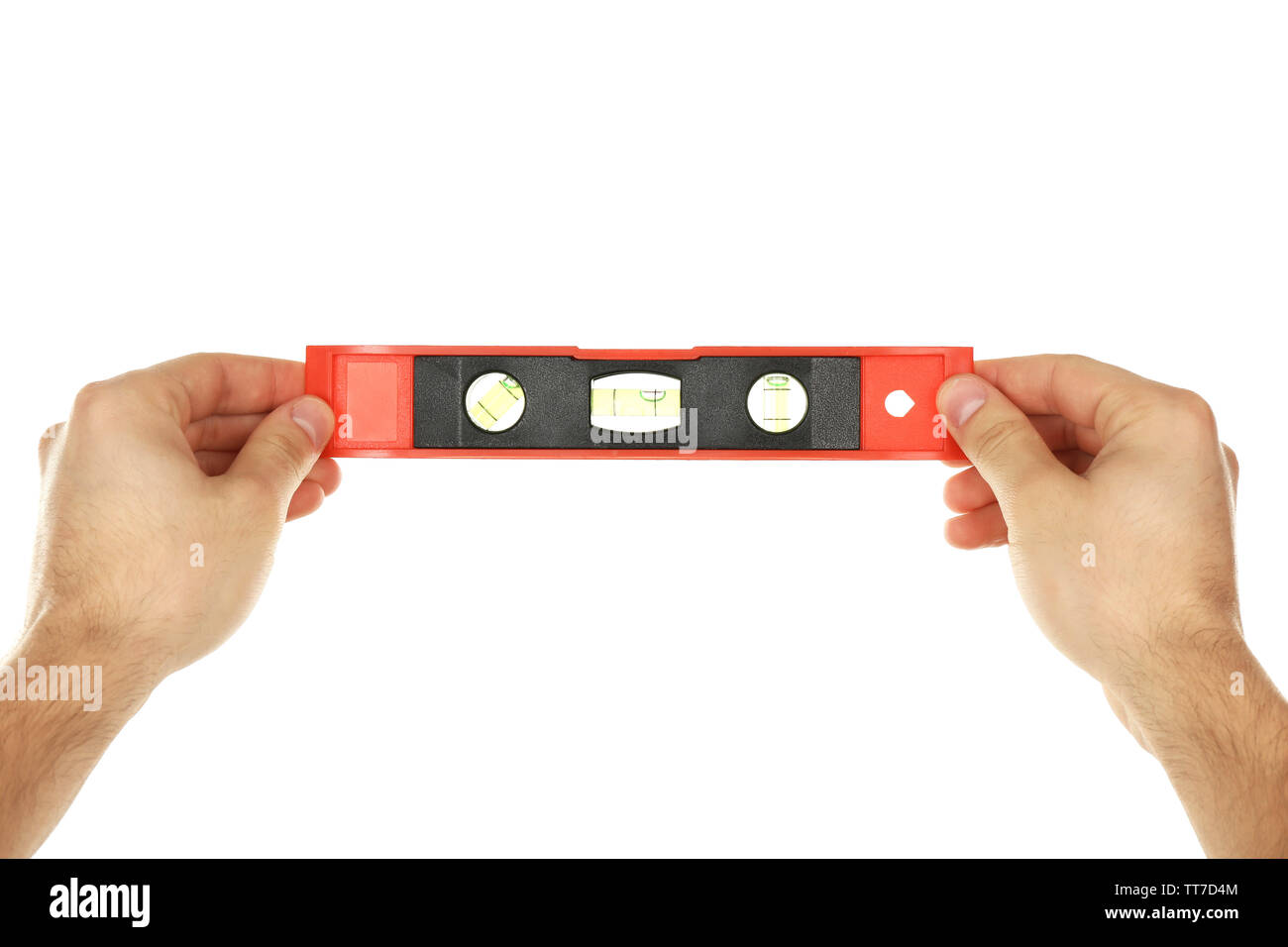 Male hands with ruler level isolated on white Stock Photo - Alamy