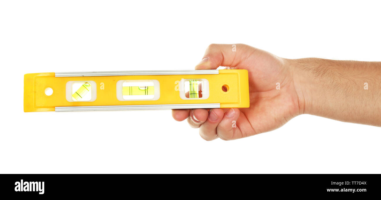 Male hand with ruler level isolated on white Stock Photo - Alamy