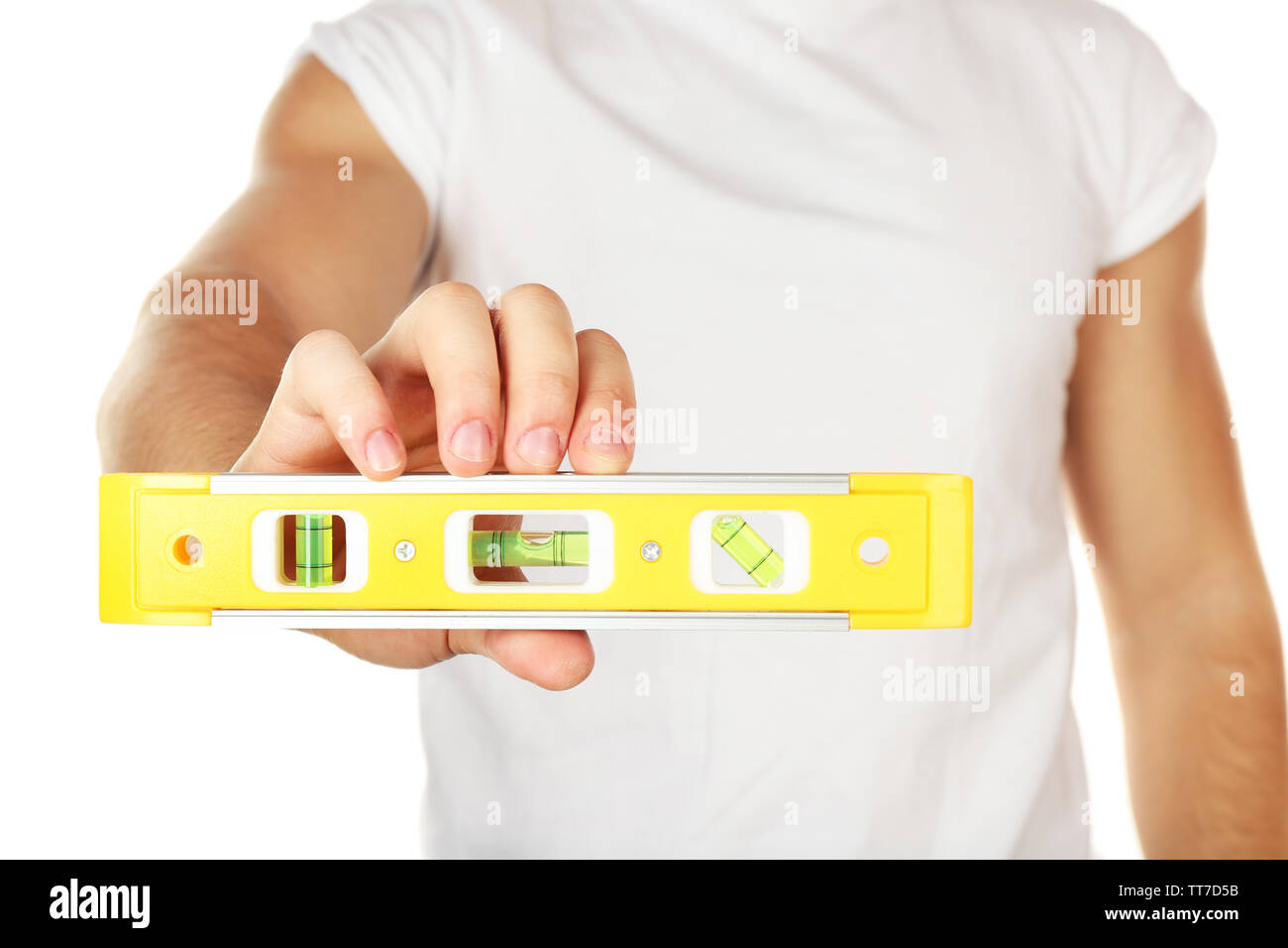 Male hand with ruler level isolated on white Stock Photo - Alamy