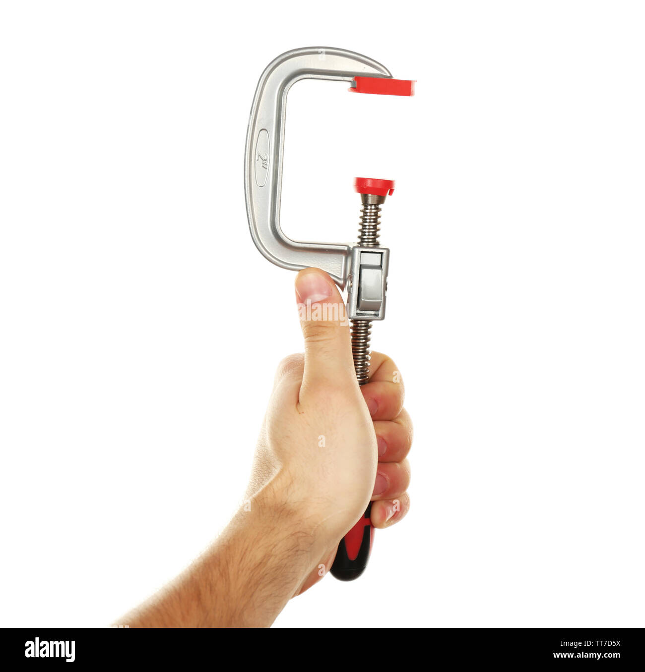 Clamp tool in male hand isolated on white Stock Photo - Alamy