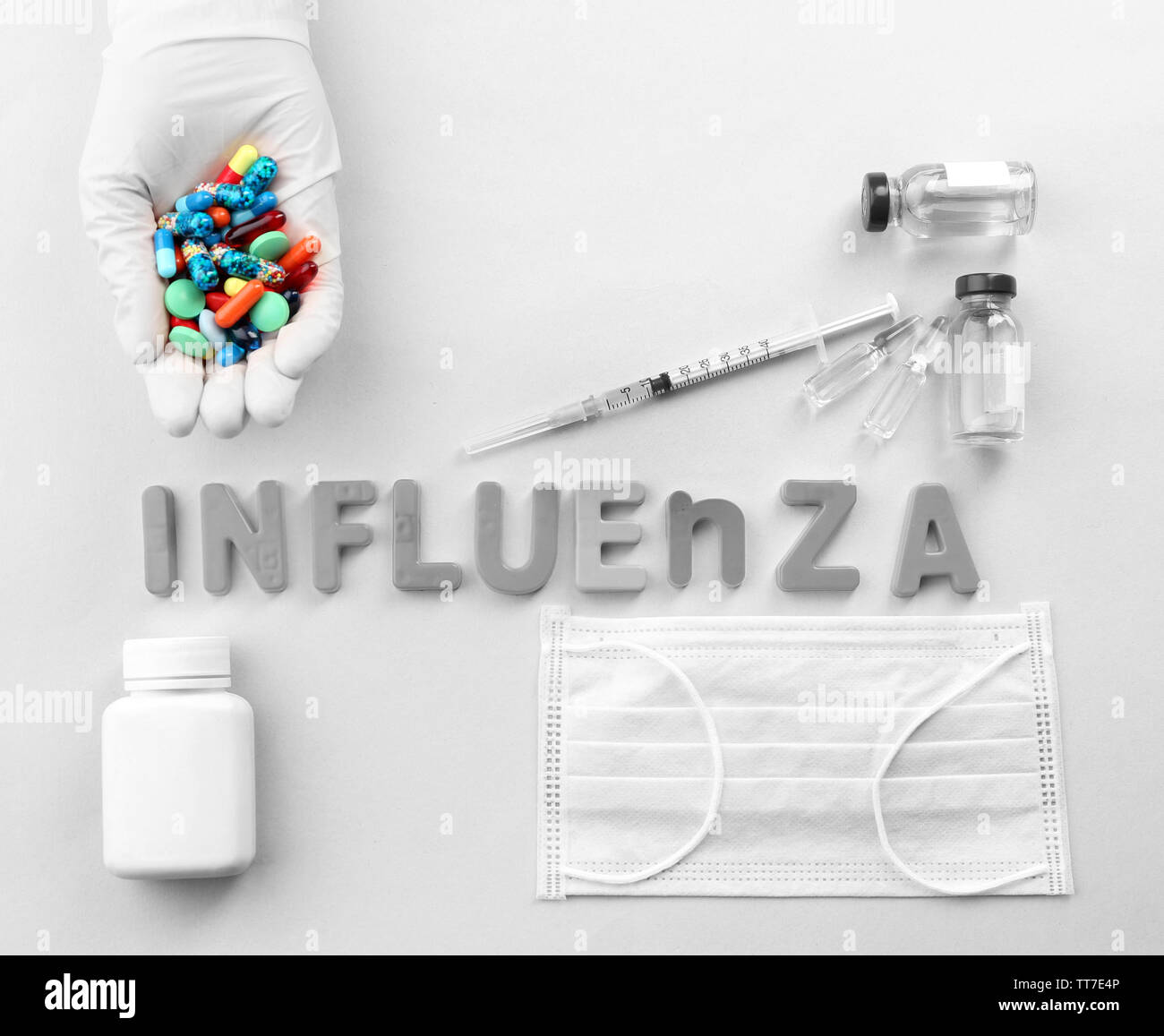 Human hand of pills Medicines with word Influenza on light background ...