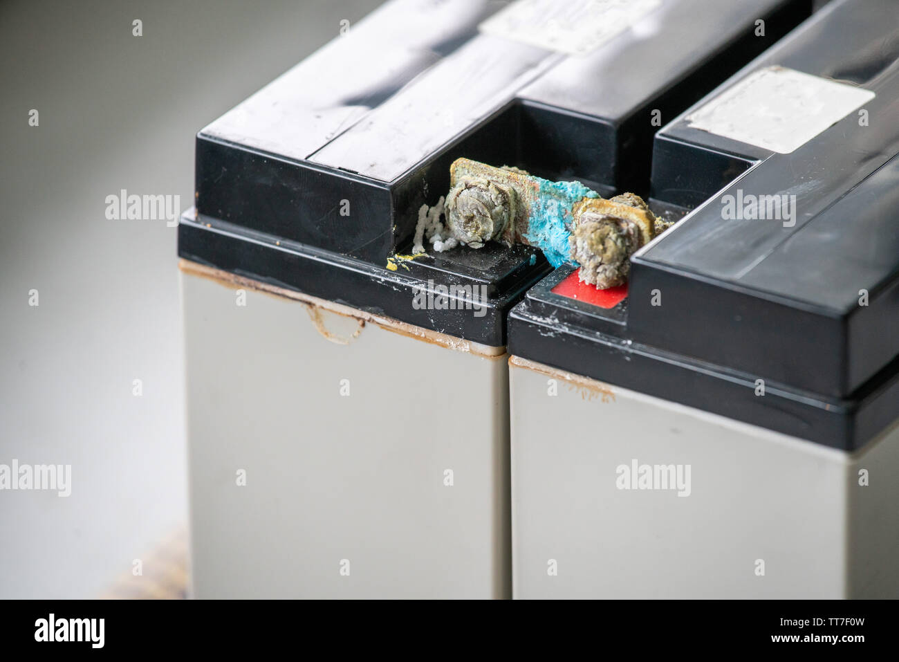 Old battery corrosion, seal lead acid battery damage Stock Photo - Alamy