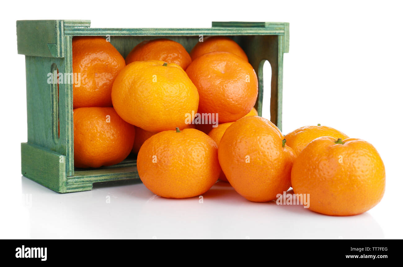 Tangerines in wooden box isolated on white Stock Photo - Alamy