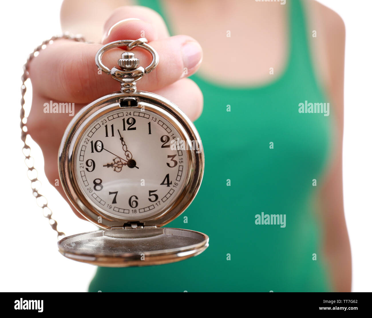Silver pocket clock in hand close-up Stock Photo - Alamy